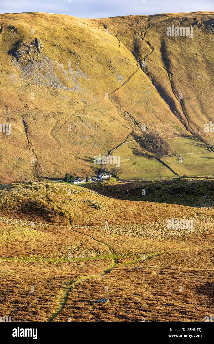 Evening light on Cote Farm set against Loadpot Hill in the English Lake ...