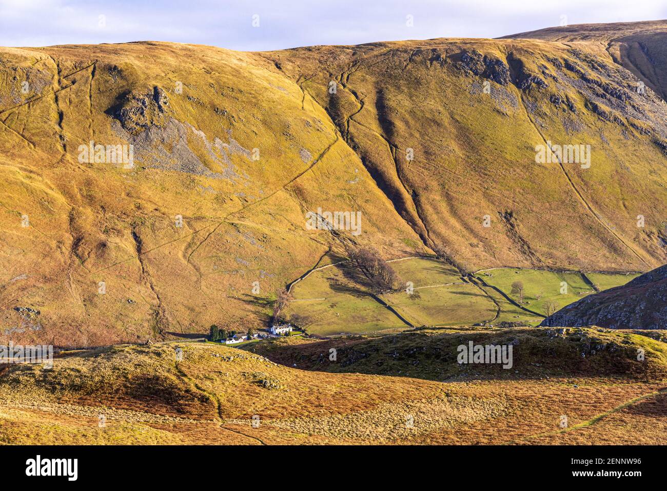 Evening light on Cote Farm set against Loadpot Hill in the English Lake ...