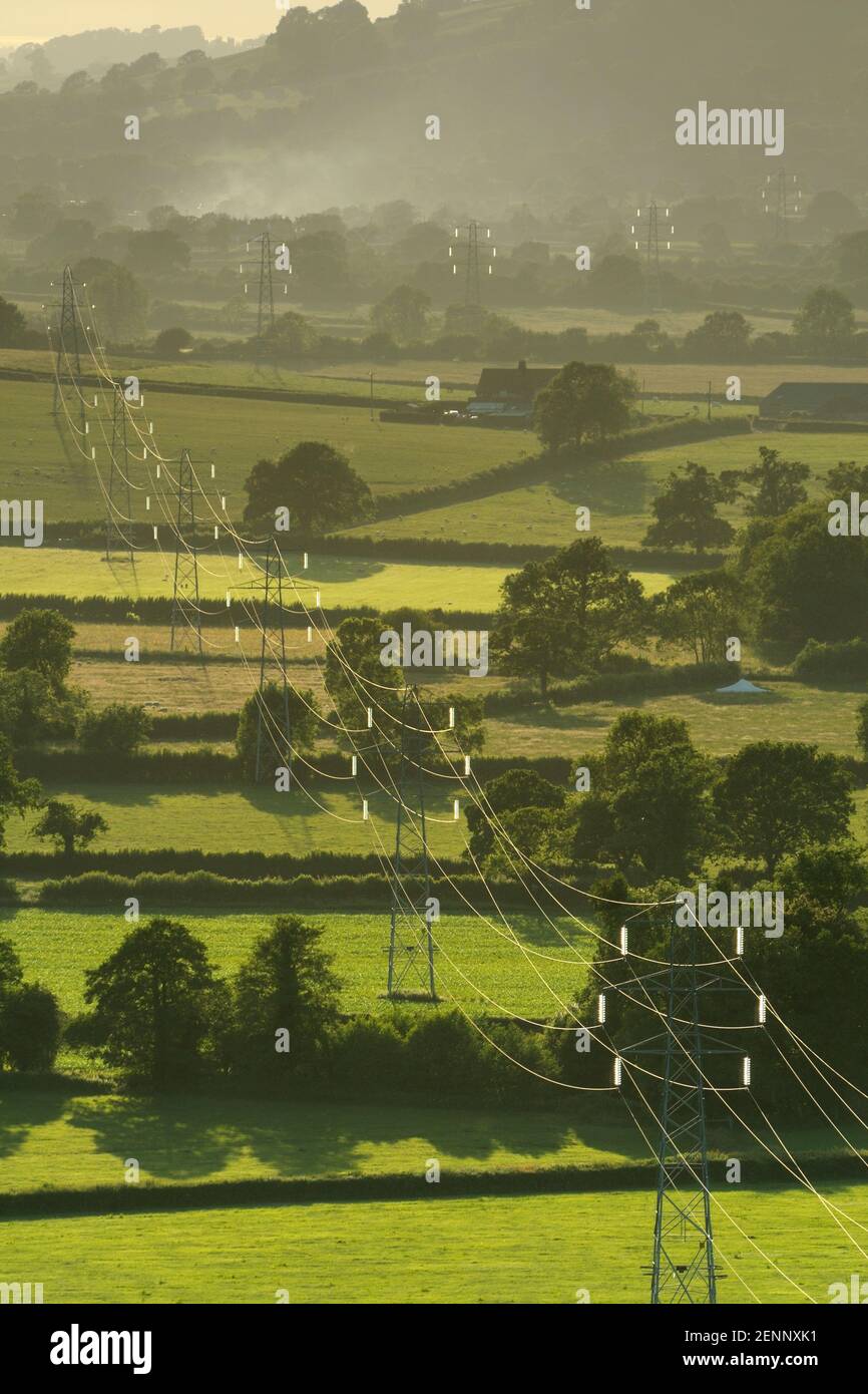 Electricity pylons running through fields near Chew Valley Lake, North ...