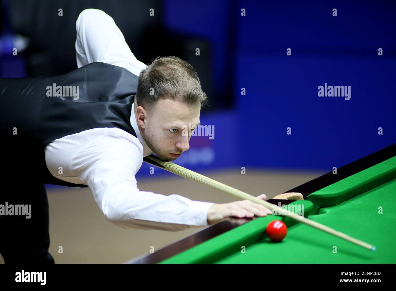 Judd Trump of England plays a shot to David Gilbert of England at the ...