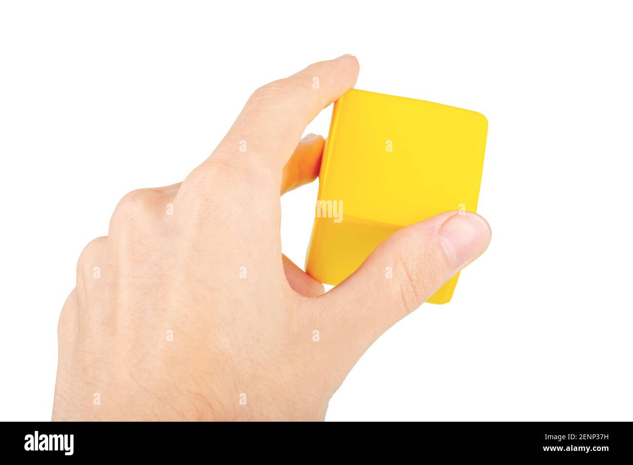 Hand holding a yellow cube, man gripping, reaching and grabbing a ...
