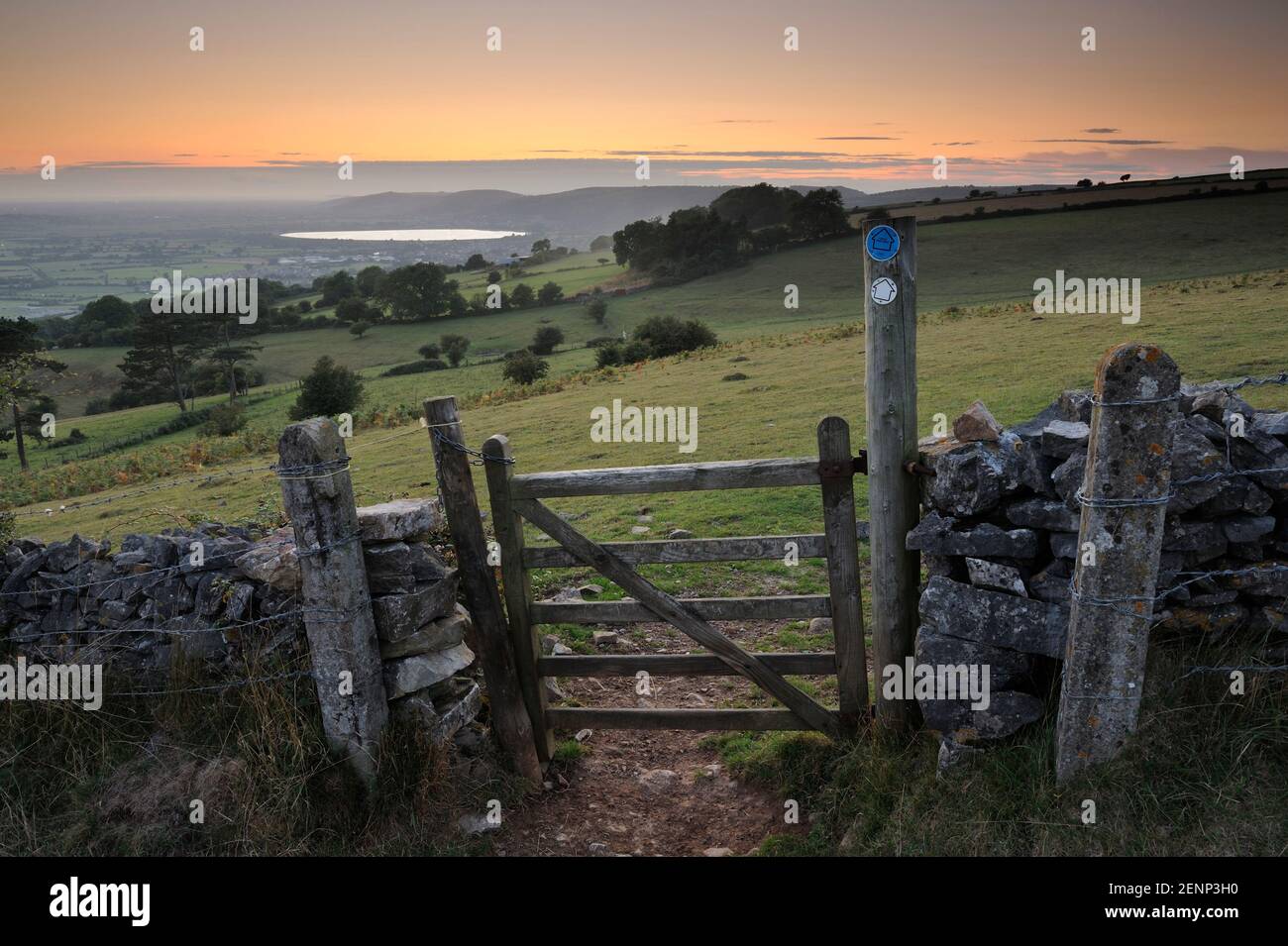 A wooden gate on the West Mendip Way recreation path running through ...