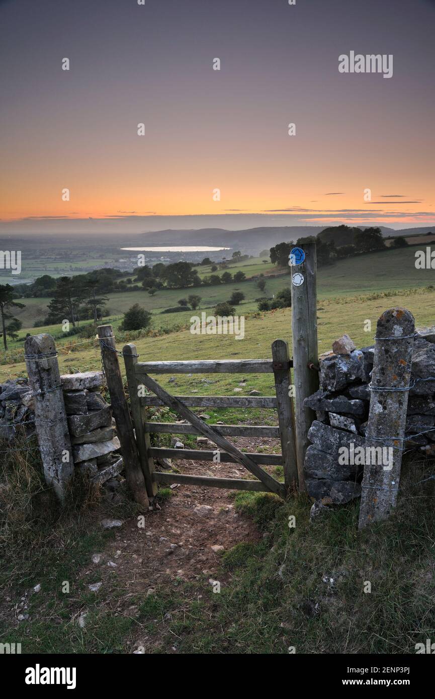A wooden gate on the West Mendip Way recreation path running through ...