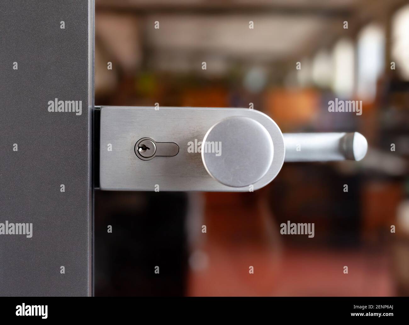 Closed empty locked office glass door modern interior metal key lock ...