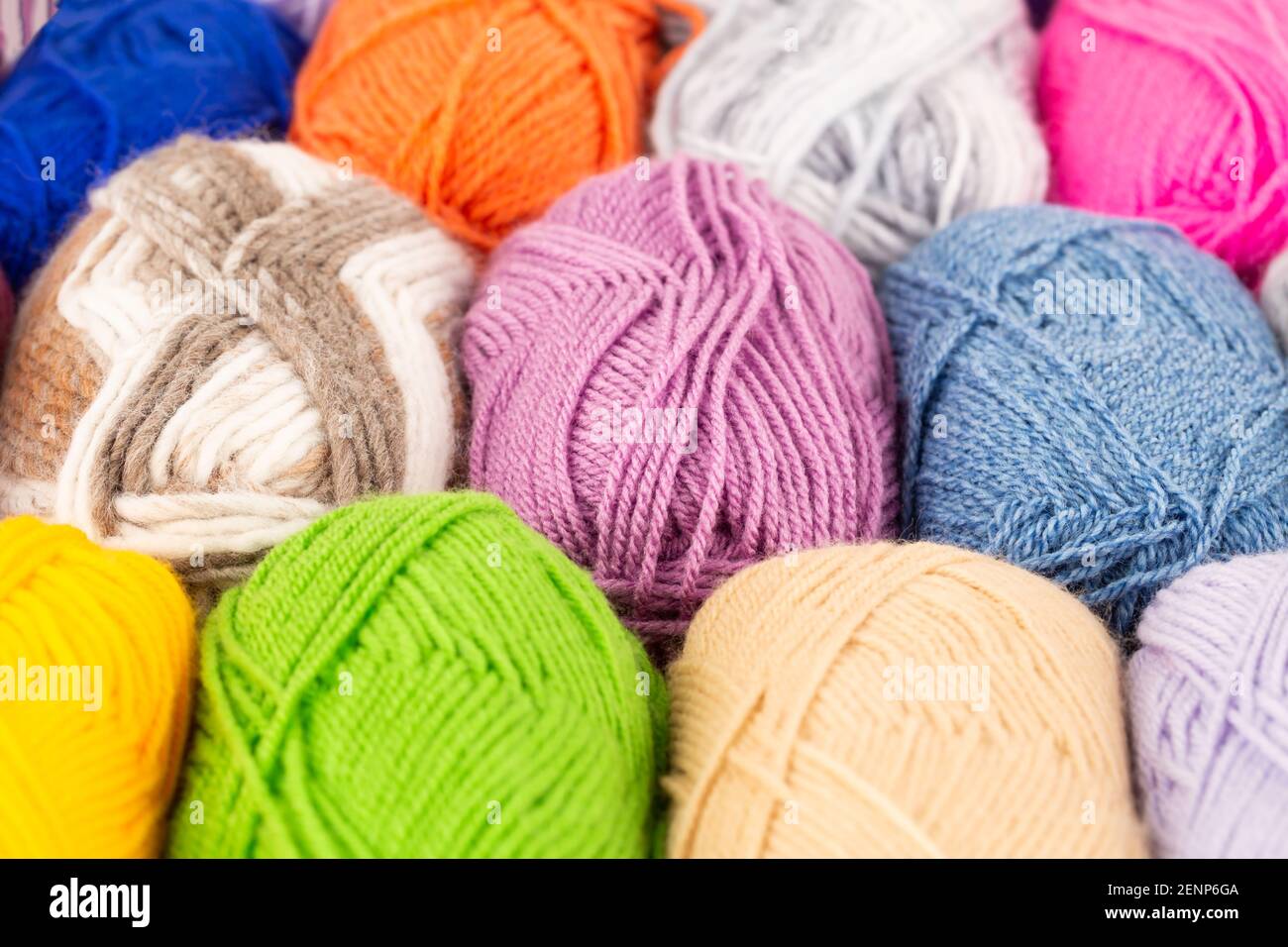 The stack of colorful knitting yarn clews close up picture Stock Photo ...