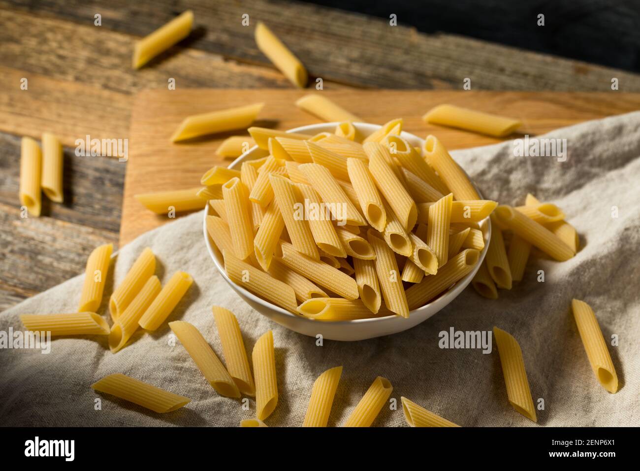 Raw Organic Dry Penne Pasta Ready to Cook Stock Photo - Alamy