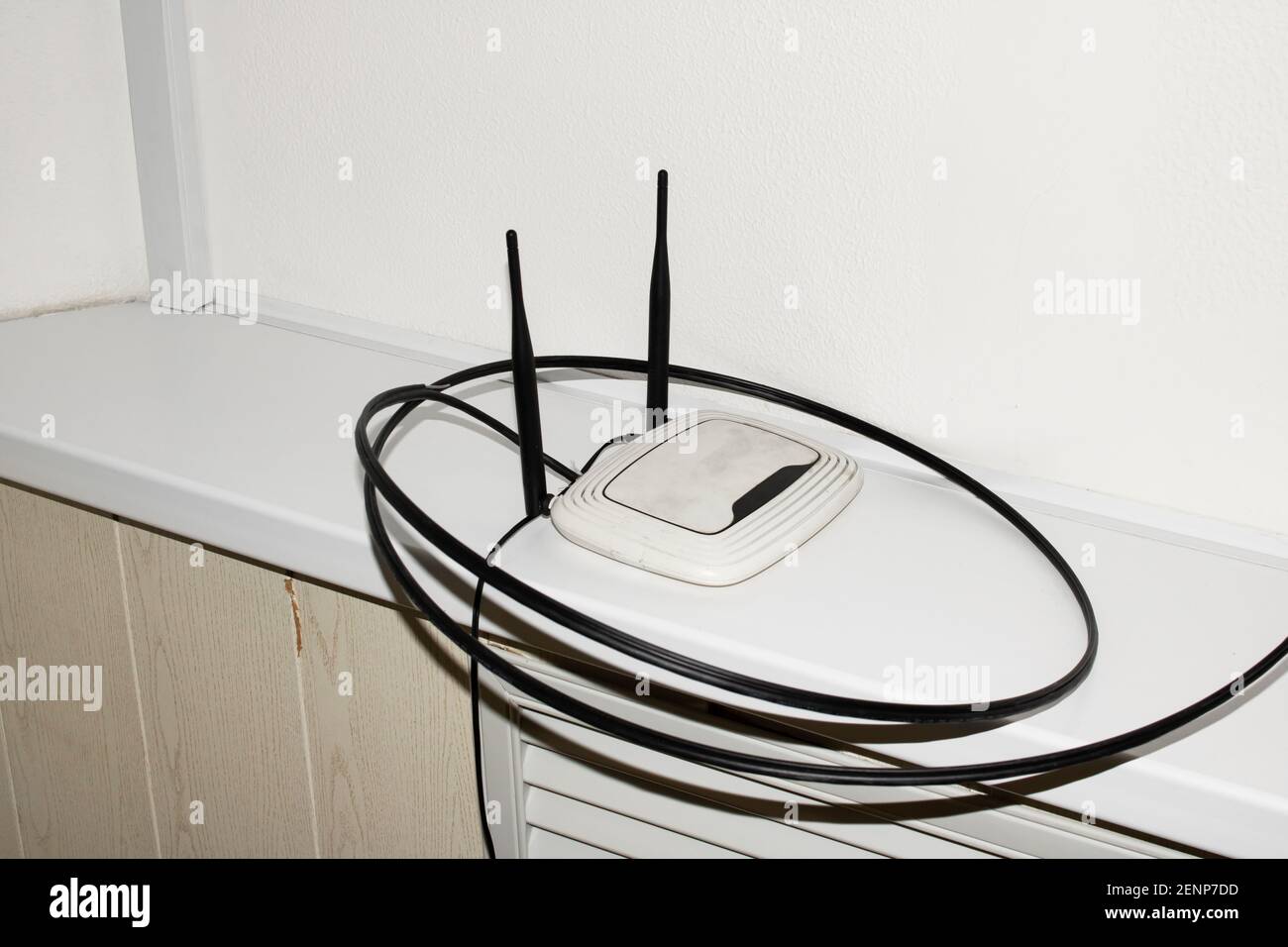 Modem with two antennas and wires close up Stock Photo - Alamy