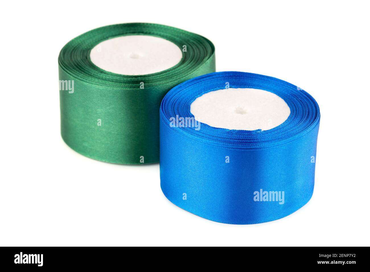 Silk ribbon reels isolated on white background Stock Photo - Alamy