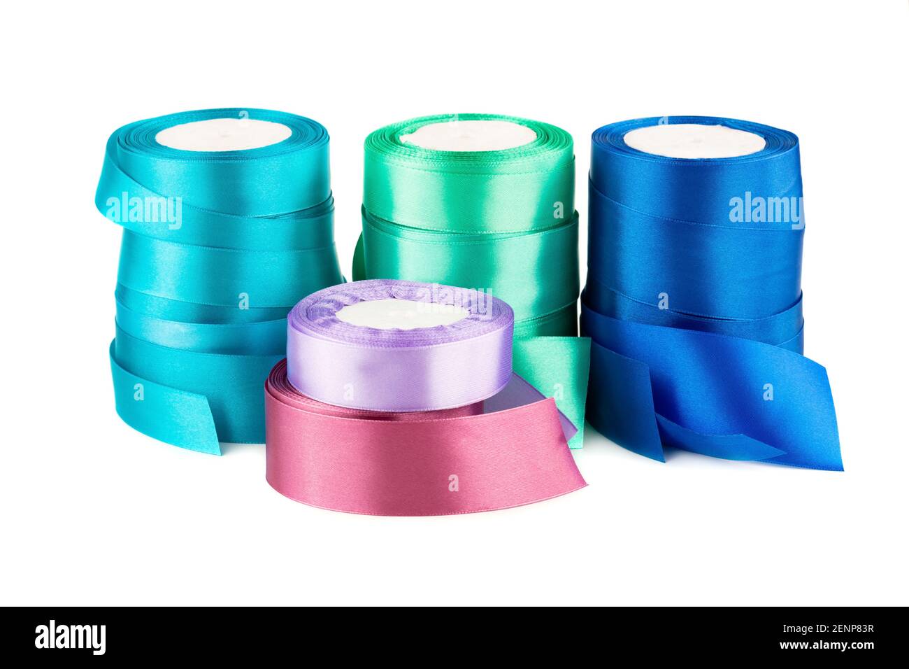 The stacks of silk ribbon reels isolated on white background Stock ...
