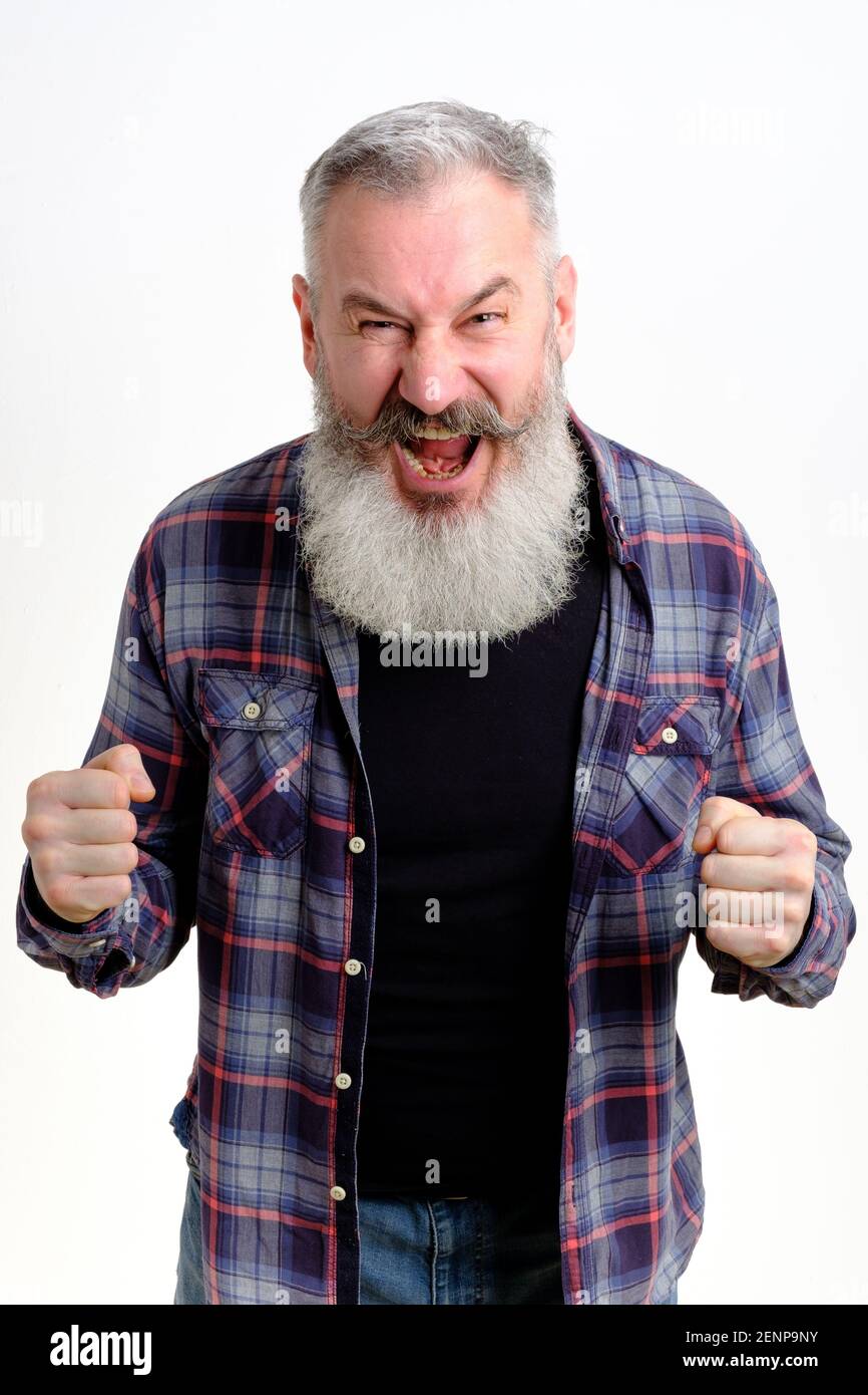 Old business man fighting hi-res stock photography and images - Alamy