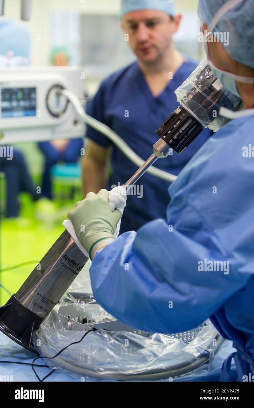 Doctors & Surgeons perform operation Stock Photo - Alamy