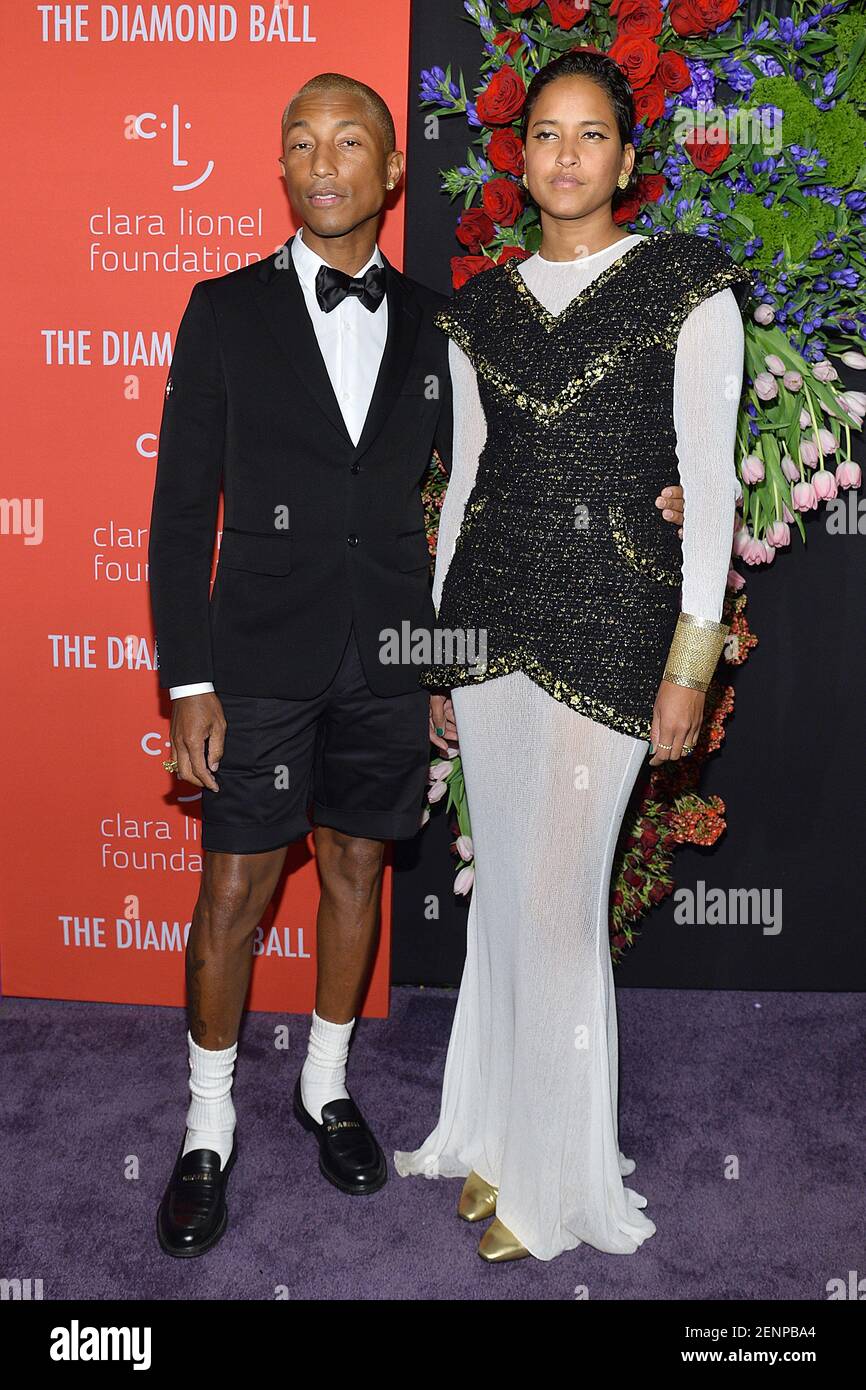 (L-R) Pharrell Williams and Helen Lasichanh attend Rihanna’s Fifth ...