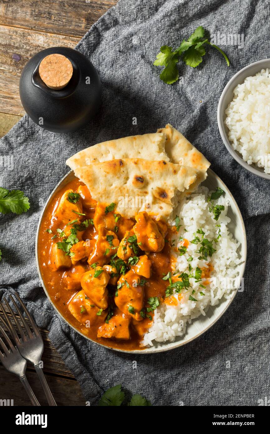 Homemade Indian Butter Chicken with Rice and Naan Bread Stock Photo - Alamy