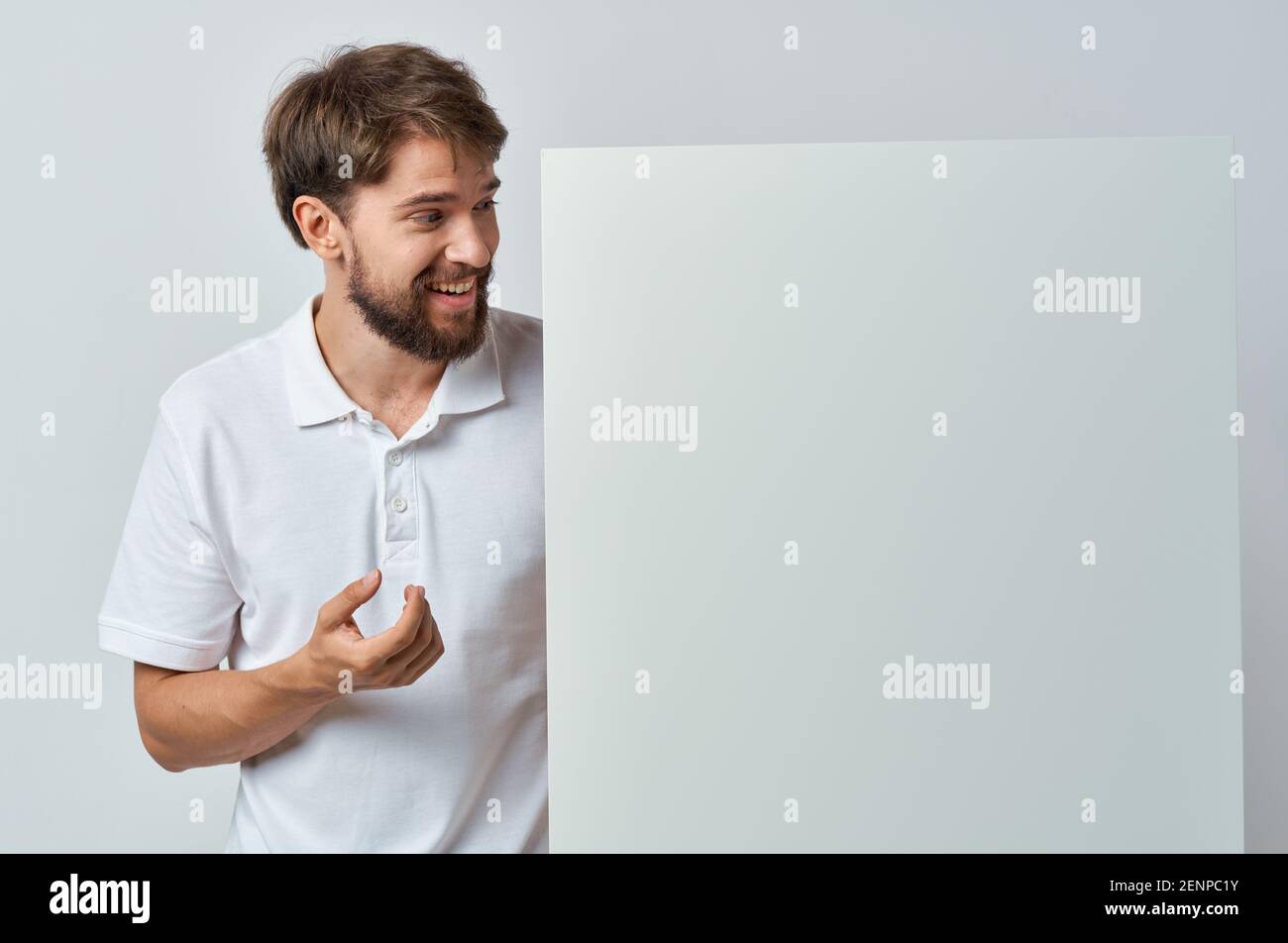 man in white shirt white banner poster advertising presentation Stock ...