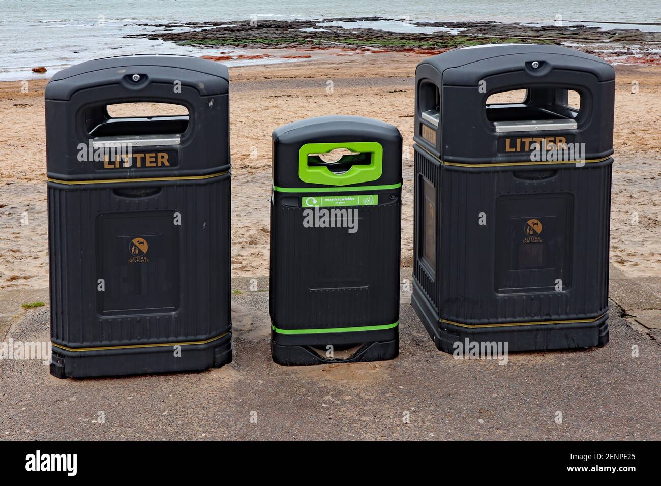 Three public refuse bins on the esplanade at Exmouth in Devon Stock ...