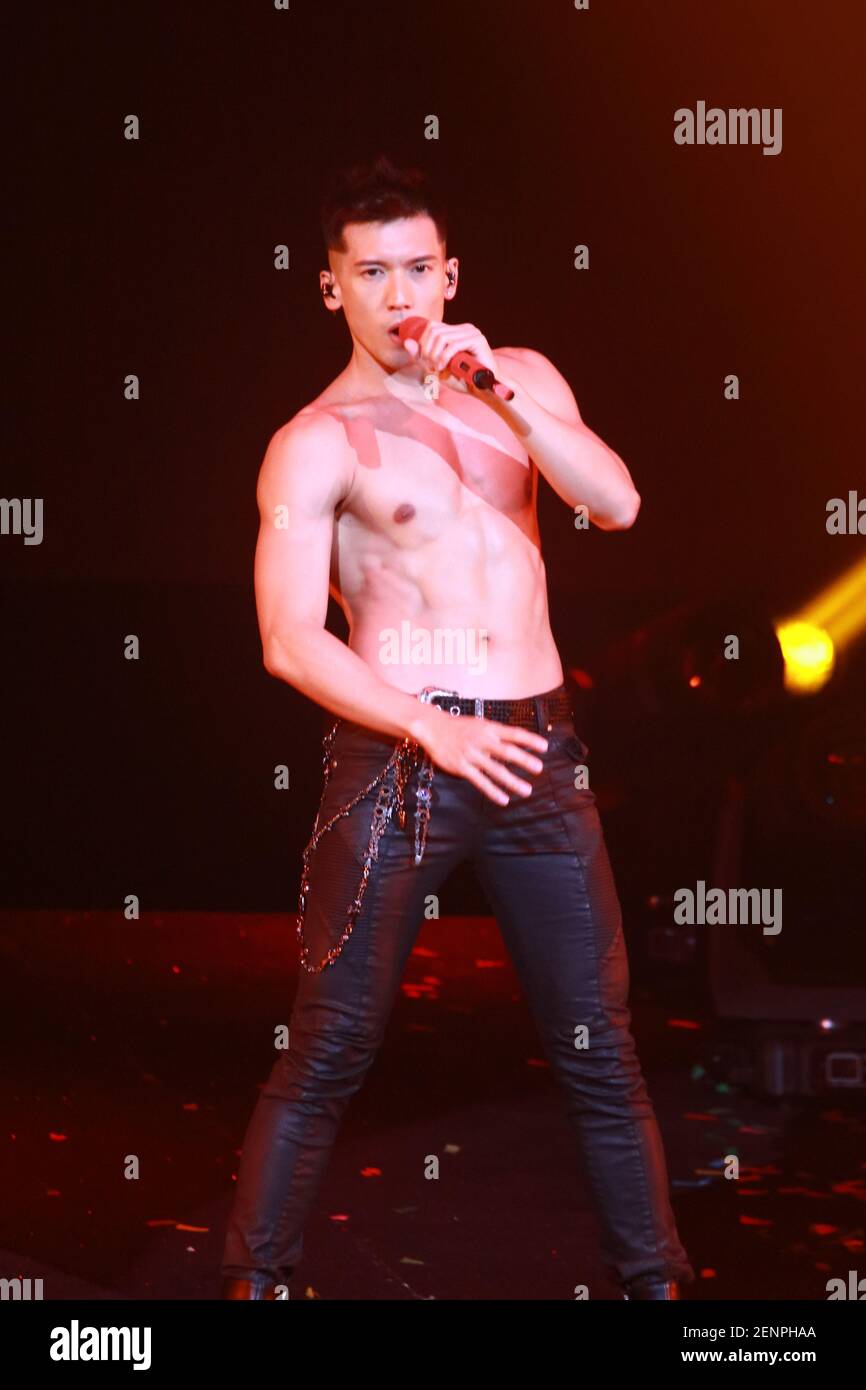 Hong Kong singer-songwriter and actor Kenny Kwan sings at his concert ...