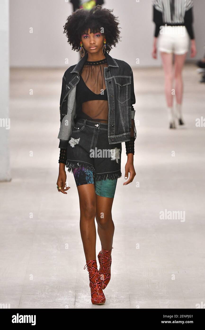 Model walking on the runway Mark Fast Fashion Show during London ...