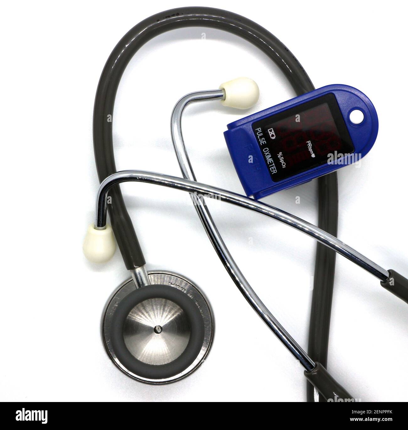 Photo of a Stethoscope and Pulse Oximeter against a white background ...