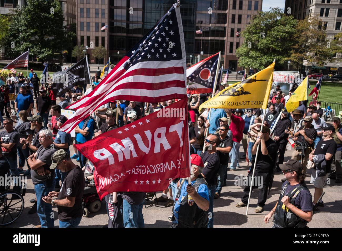 Protesters with flags during a pro-gun rally against the general gun ...
