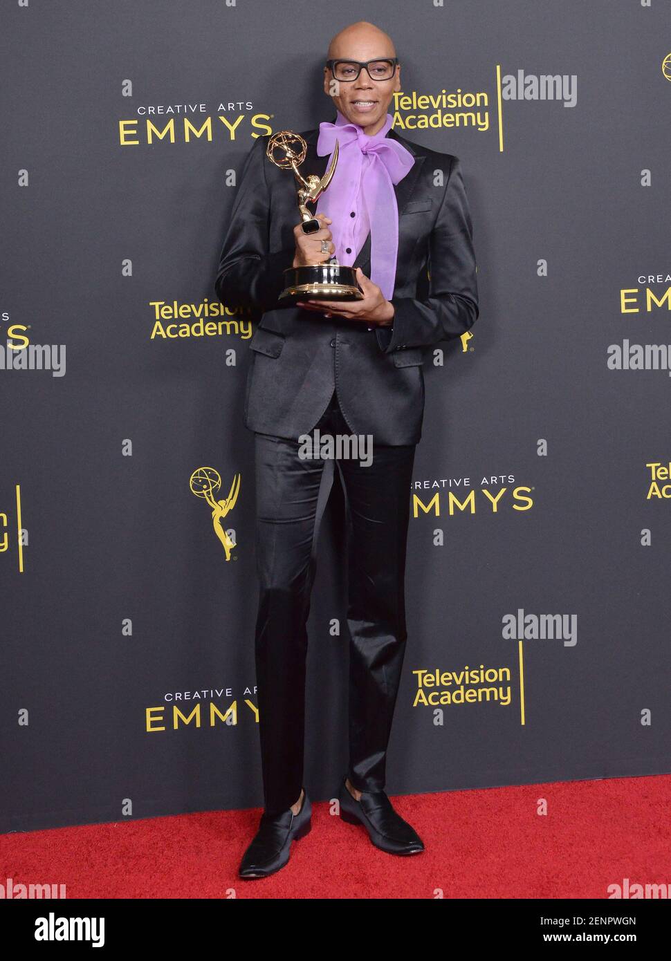 RuPaul, winner of the award for outstanding host for a reality or ...