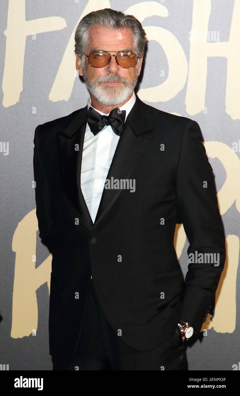 Pierce Brosnan on the red carpet for Naomi Campbell's Fashion For ...