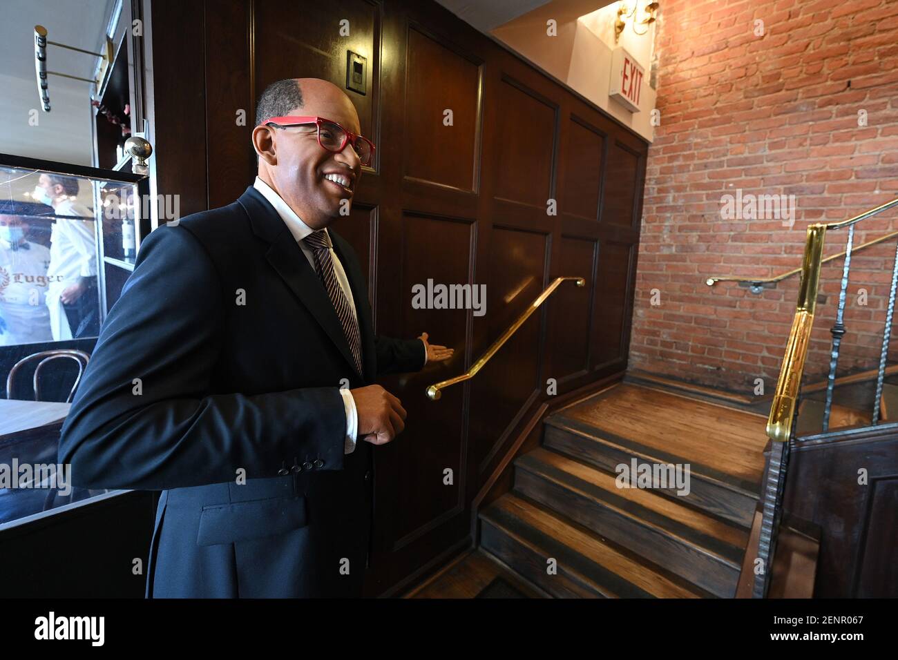 New York, USA. 26th Feb, 2021. A wax figure of Al Roker stands at the ...