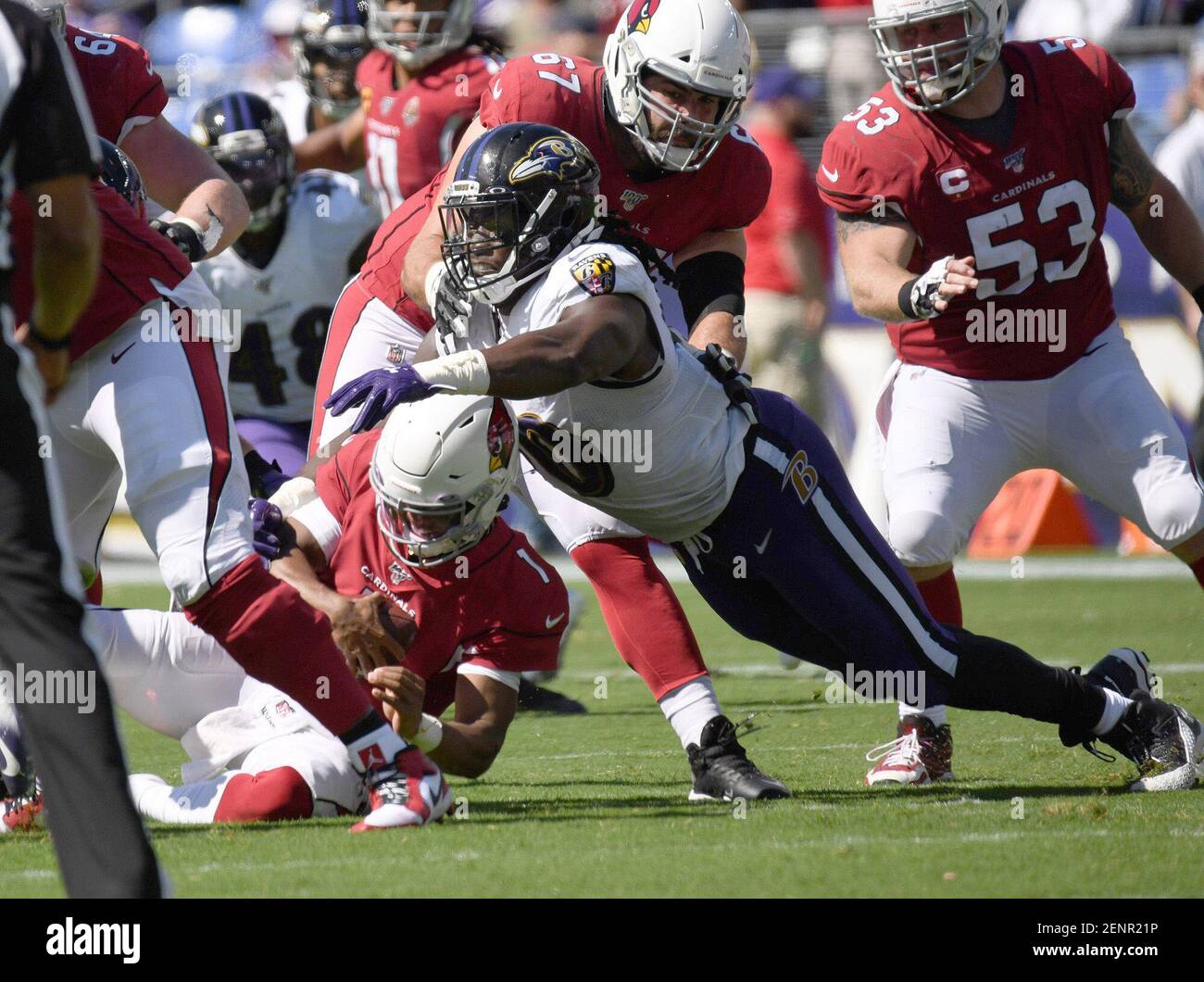 Baltimore Ravens' Pernell McPhee, right, sacks Arizona Cardinals ...