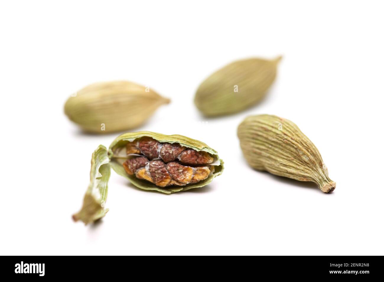 Cardamom fruit with hearts open Stock Photo - Alamy