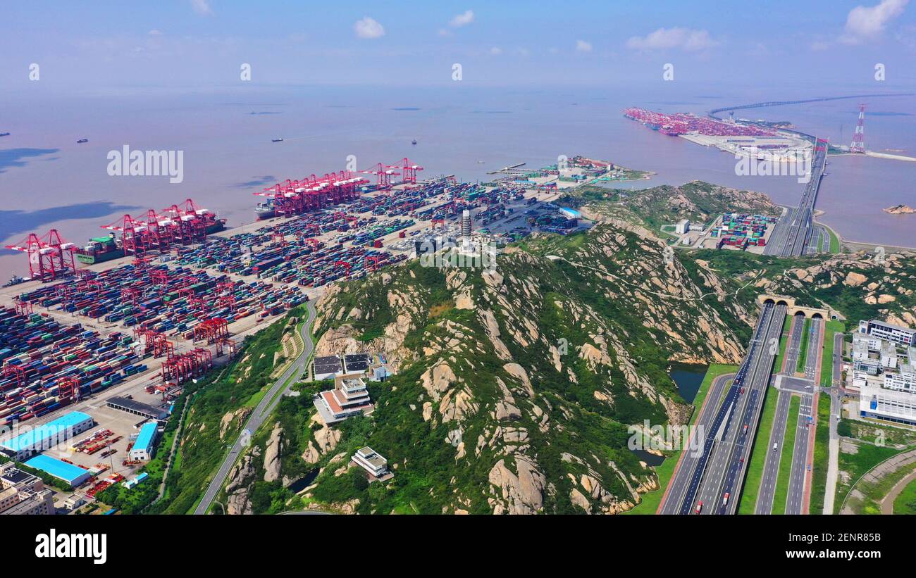 An aerial view of containers stored at Yangshan Port, a deep water port ...