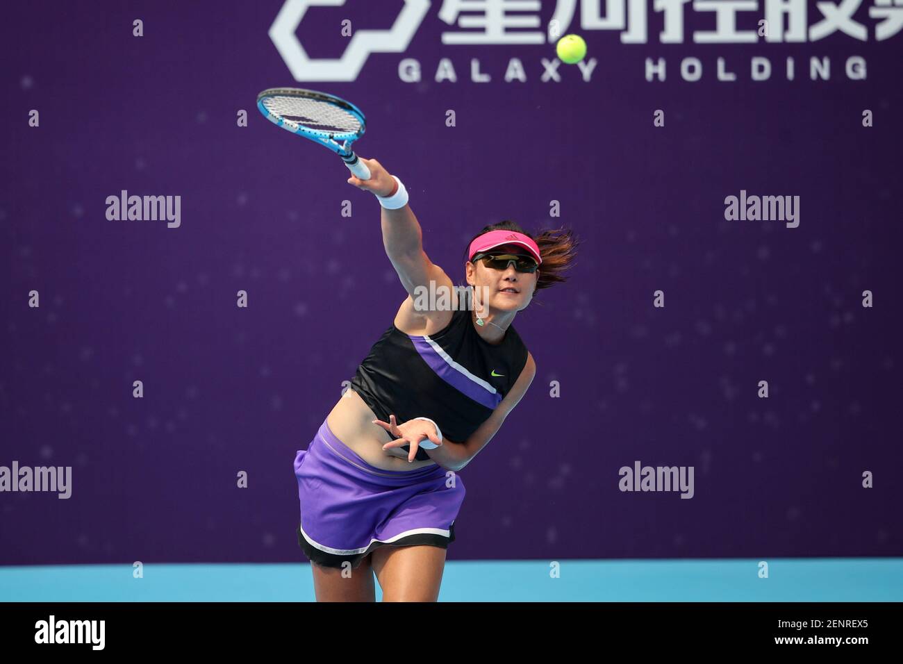 Chinese tennis player Duan Yingying serves the ball at the first round ...