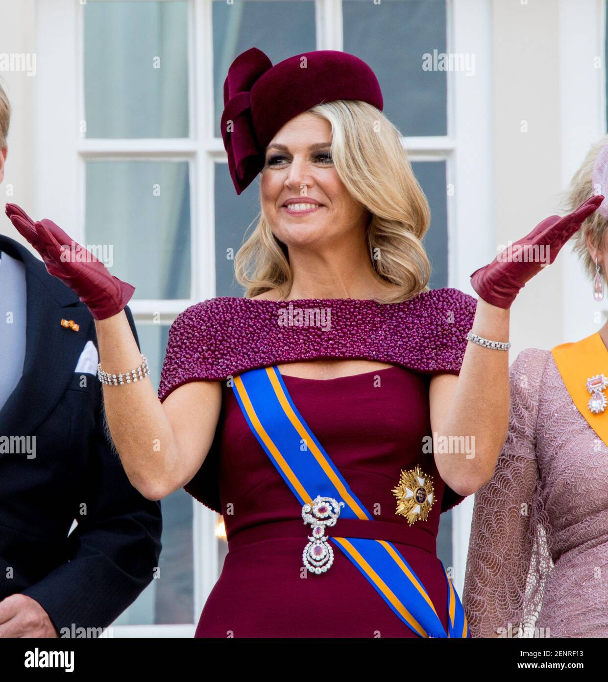 Queen Maxima of the Netherlands wave to bystanders from the balcony at ...