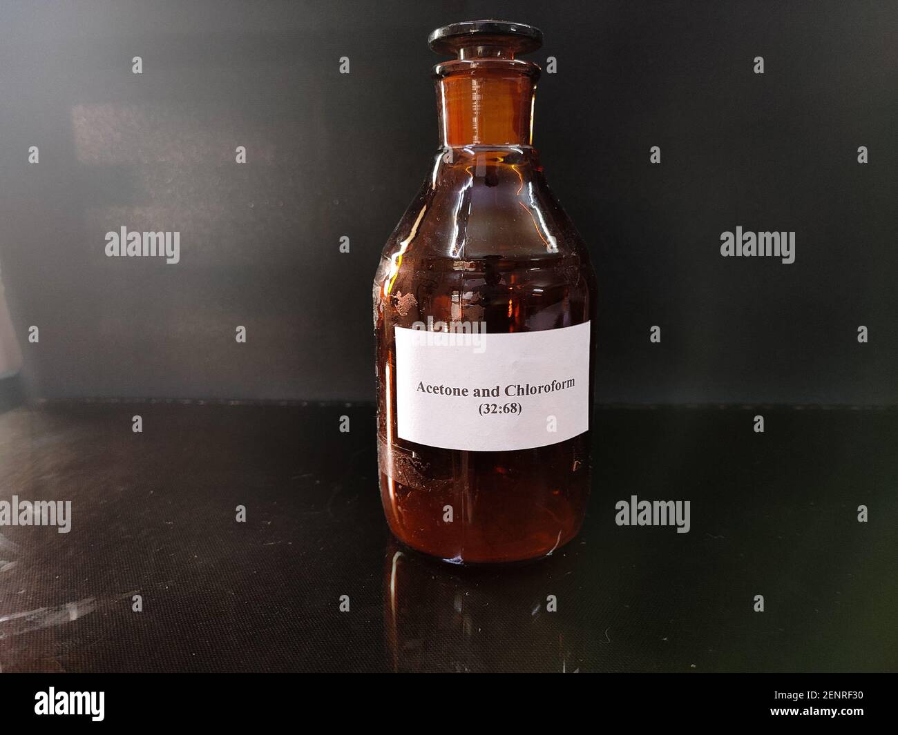 brown bottle filled with reagent solution Stock Photo - Alamy