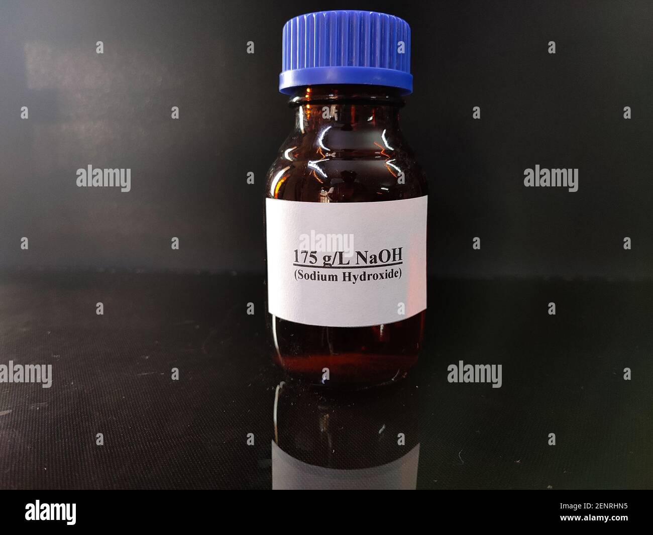 brown bottle filled with reagent solution Stock Photo - Alamy