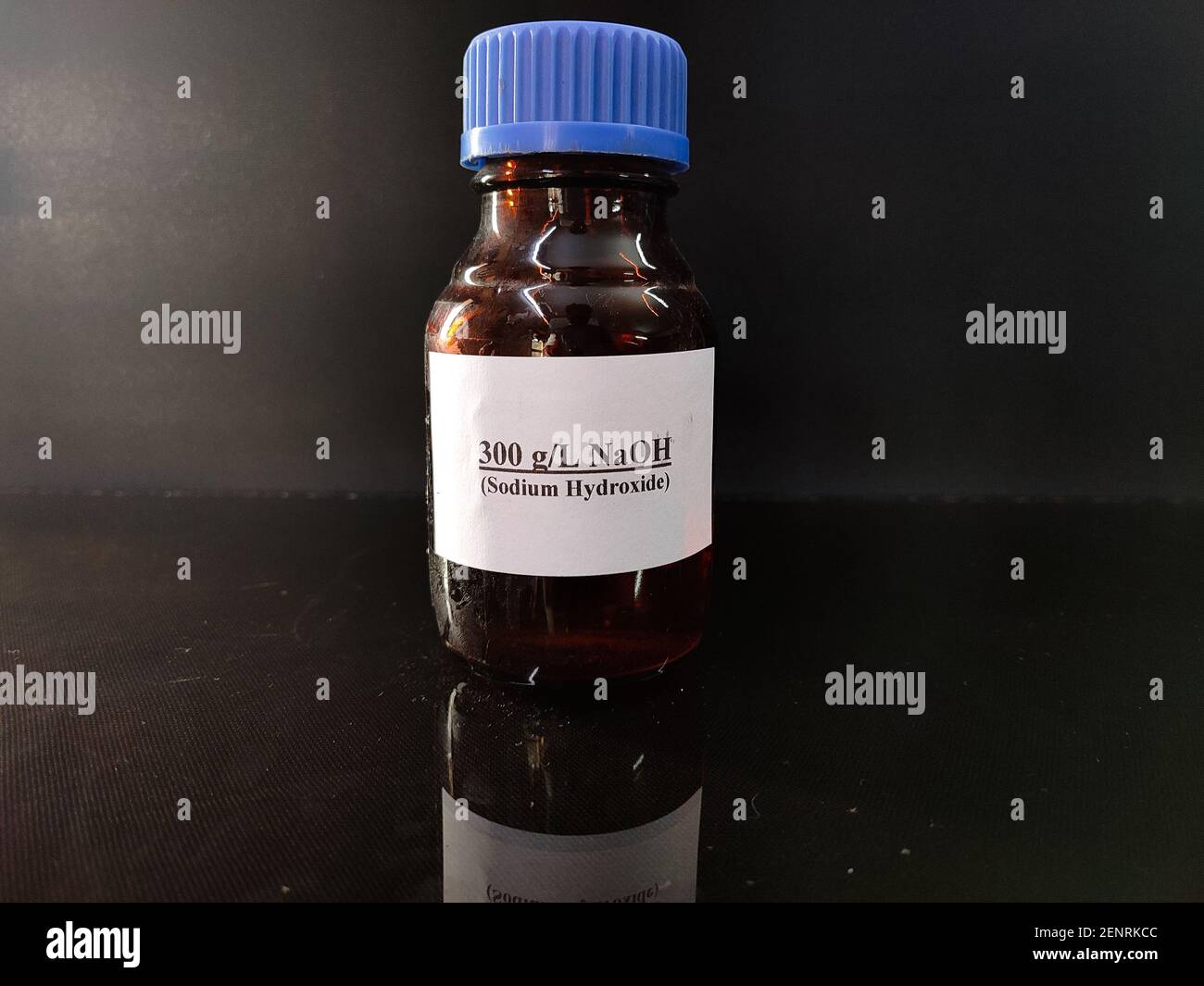 brown bottle filled with reagent solution Stock Photo - Alamy