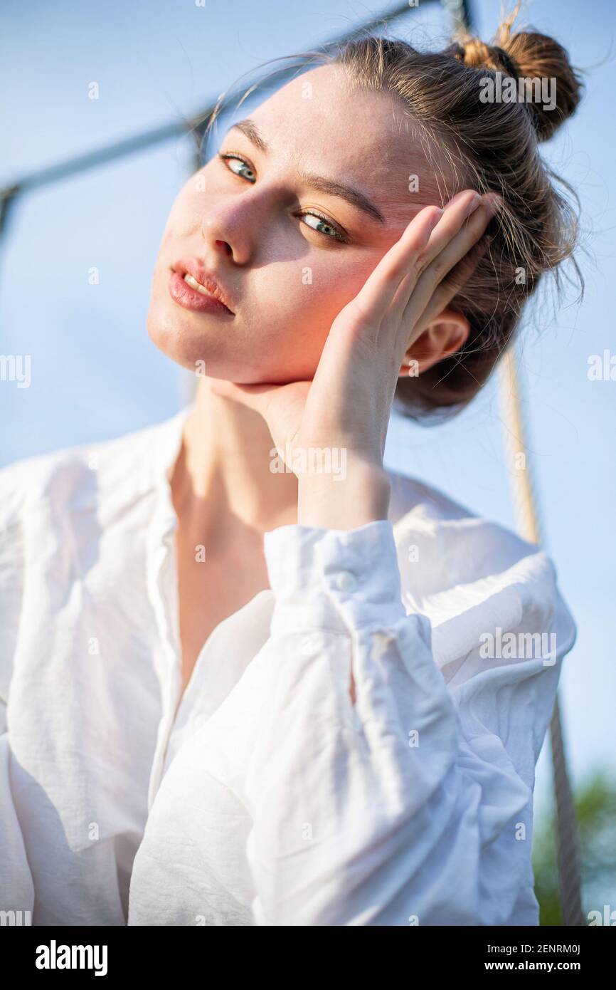 Young woman blonde hair pulled back hi-res stock photography and images ...