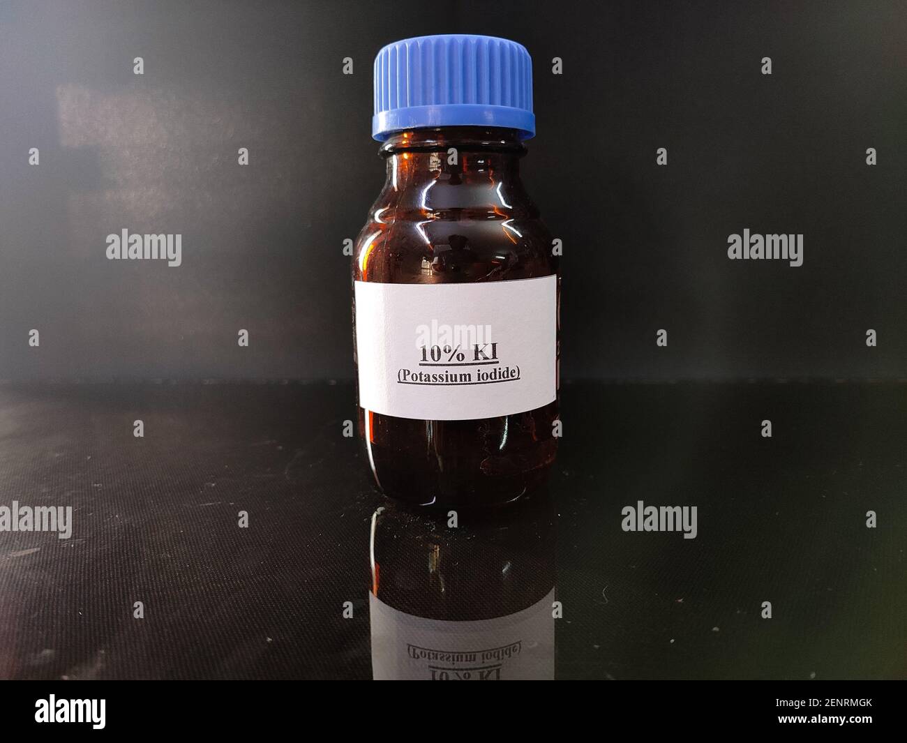 brown bottle filled with reagent solution Stock Photo - Alamy