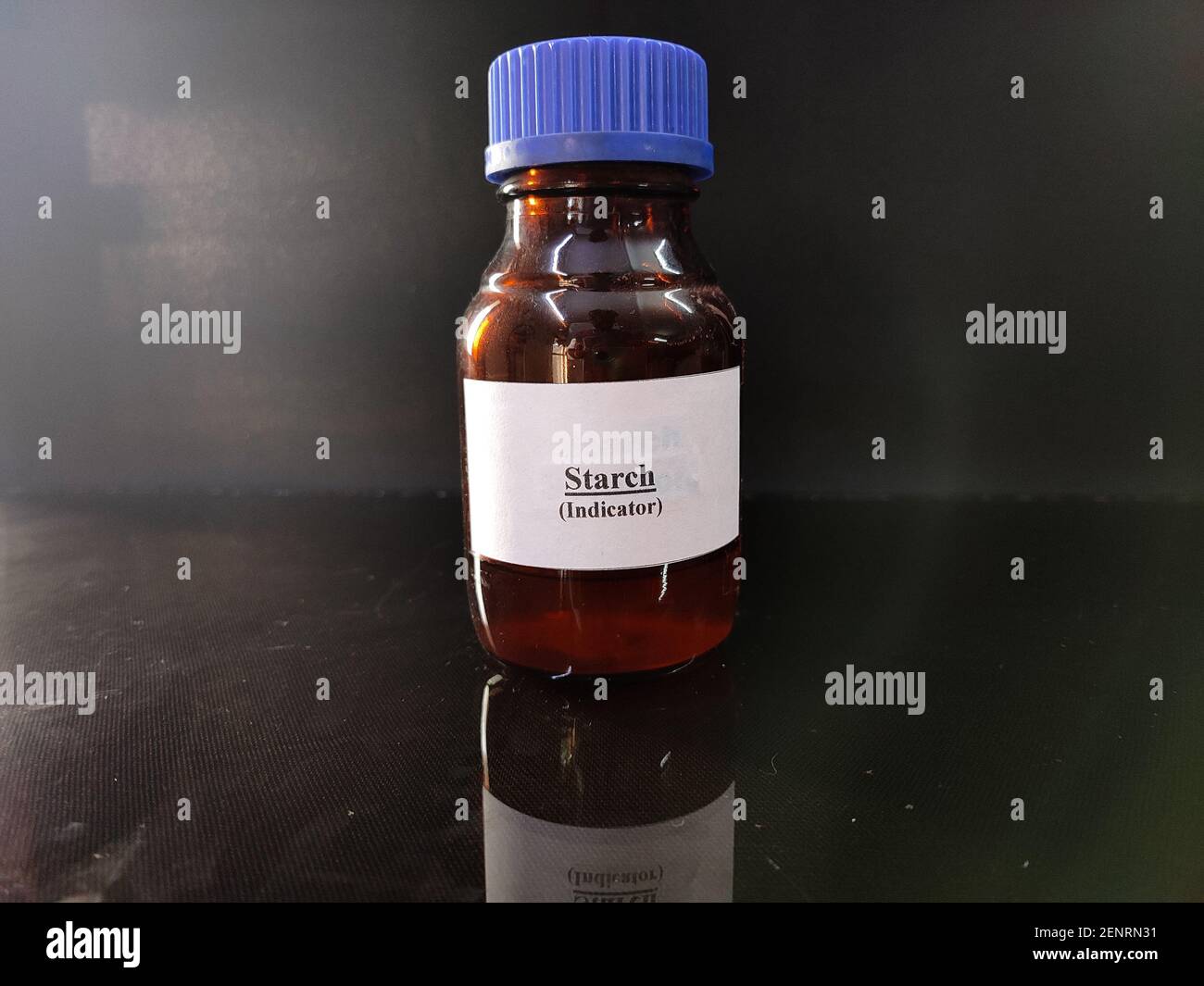 brown bottle filled with reagent solution Stock Photo - Alamy