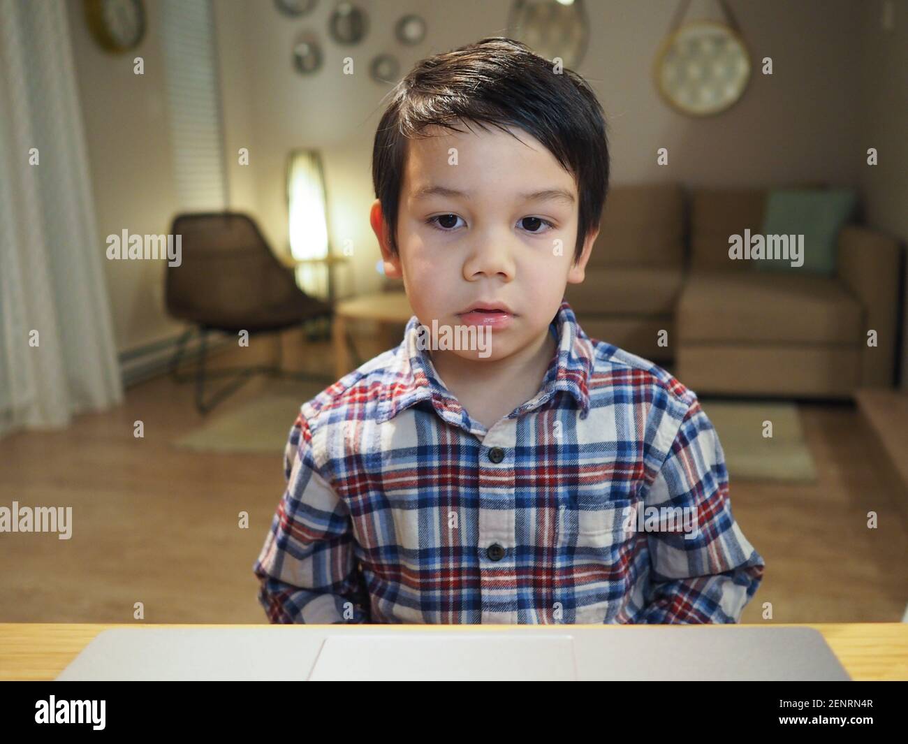 Webcam view of a boy attending an online class Stock Photo - Alamy