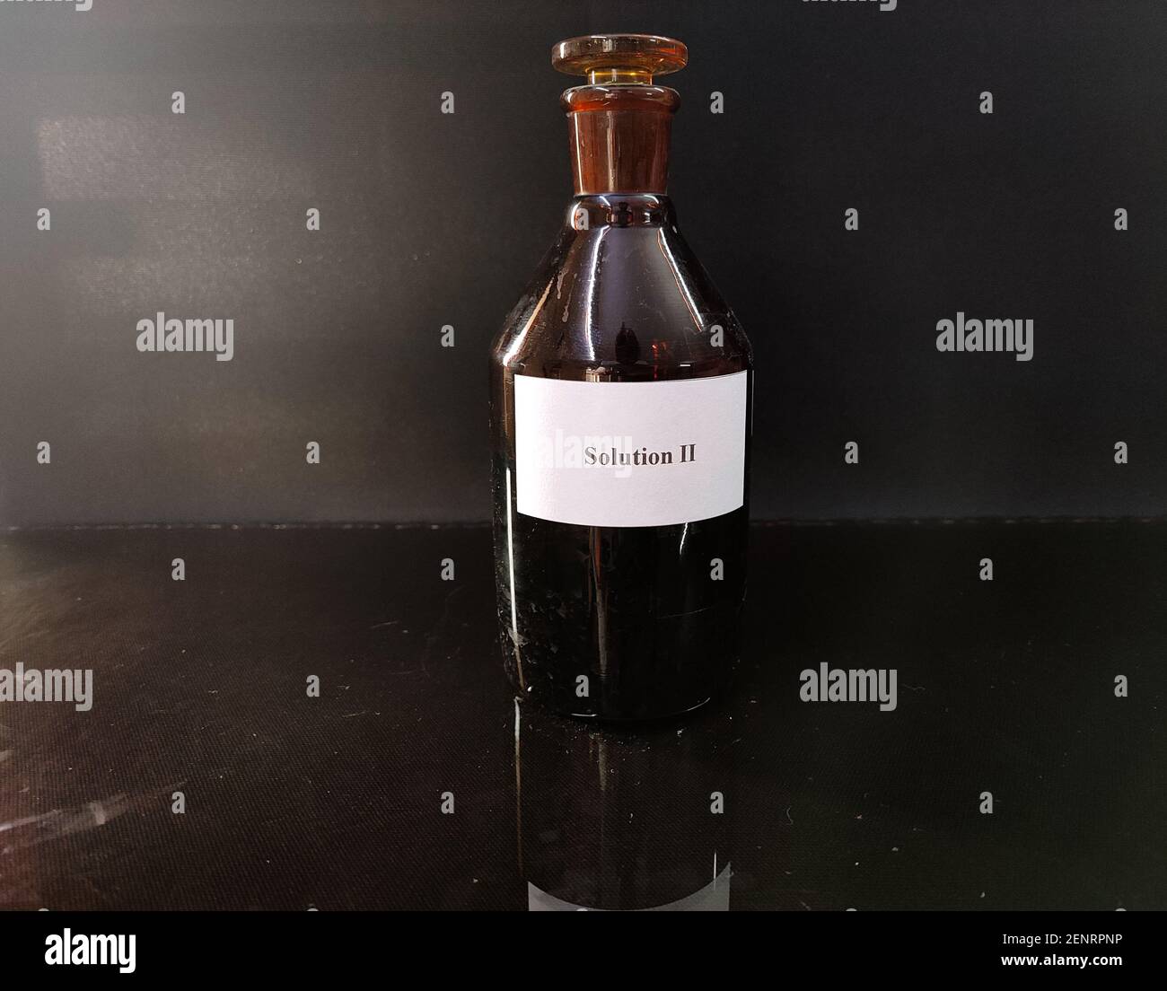 brown bottle filled with reagent solution Stock Photo - Alamy