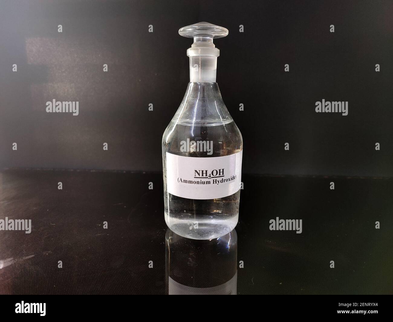 transparent bottle filled with reagent solution Stock Photo - Alamy