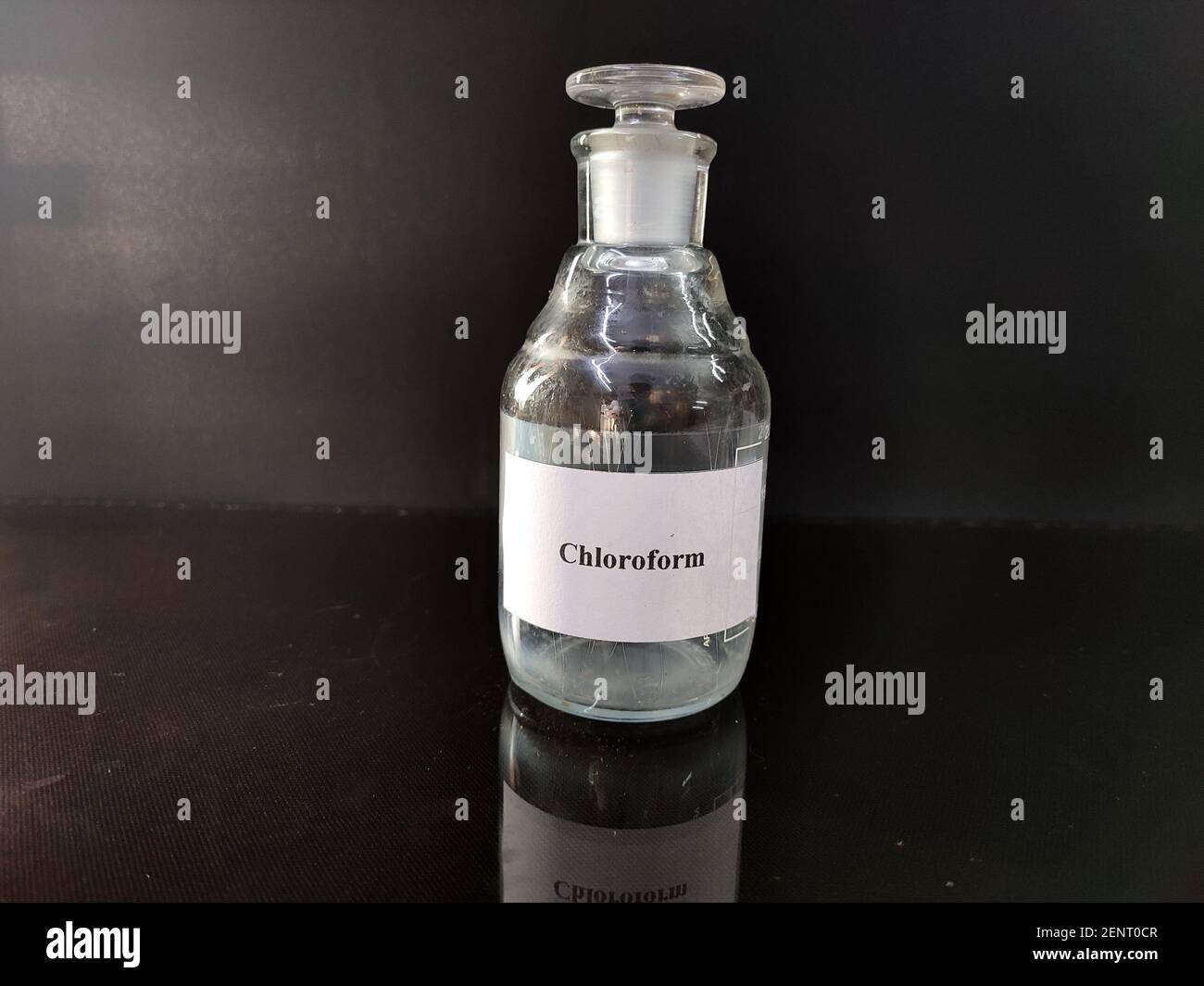 transparent bottle filled with reagent solution Stock Photo - Alamy