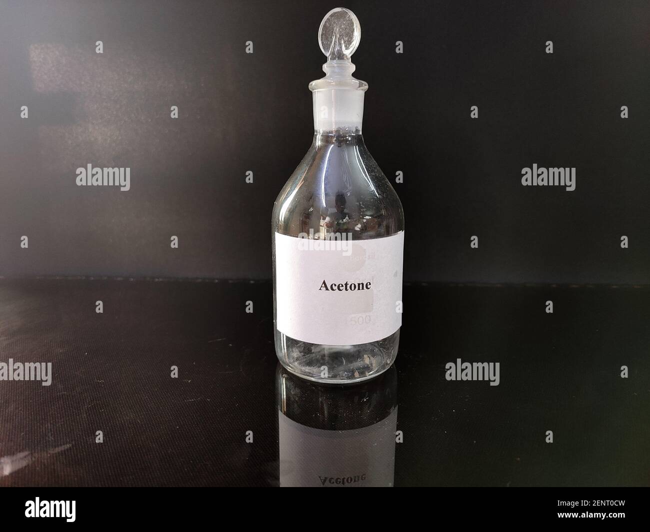 transparent bottle filled with reagent solution Stock Photo - Alamy