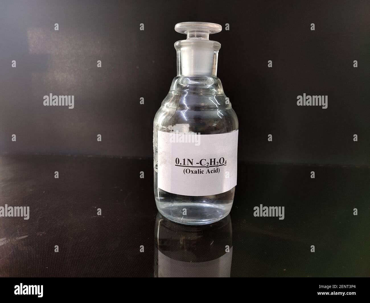 transparent bottle filled with reagent solution Stock Photo - Alamy