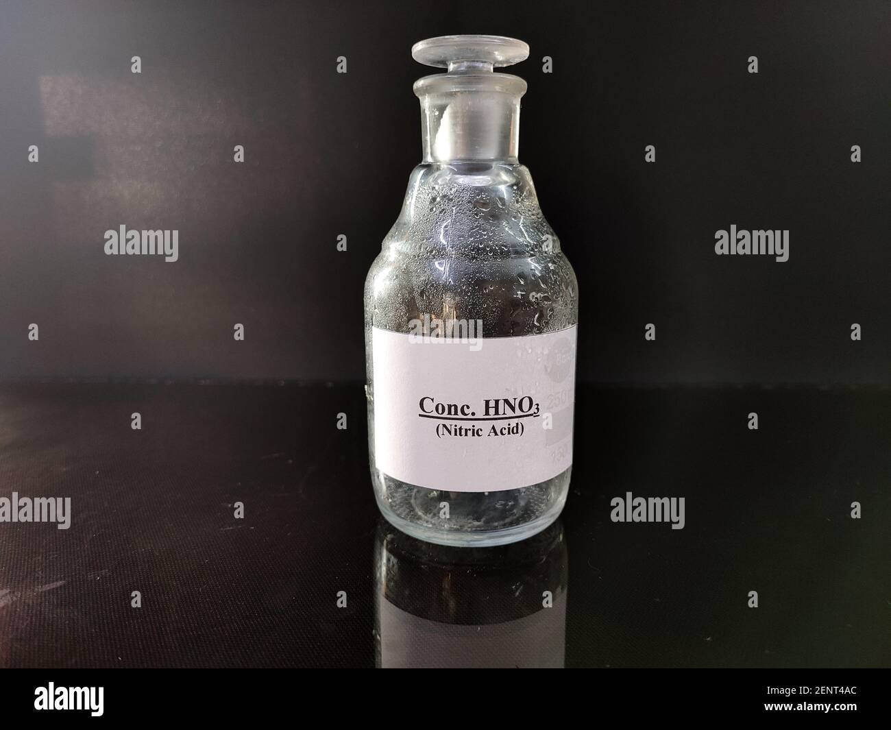 transparent bottle filled with reagent solution Stock Photo - Alamy