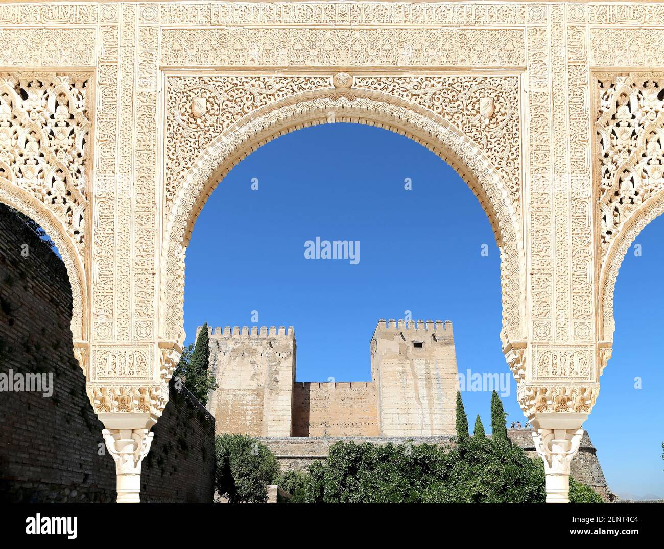 Arches in Islamic (Moorish) style and Alhambra, Granada, Spain Stock ...