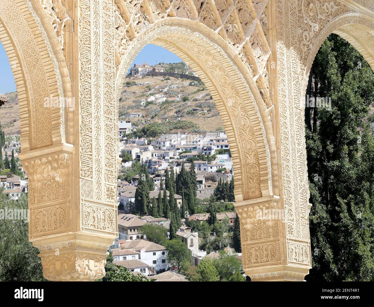 Arches in Islamic (Moorish) style and Alhambra, Granada, Spain Stock ...