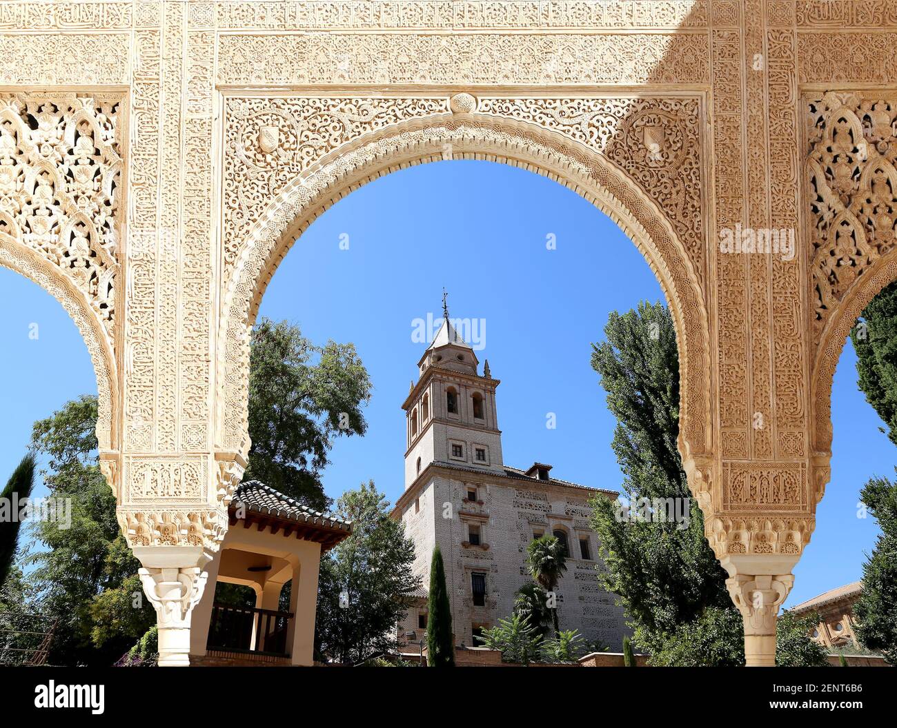 Arches in Islamic (Moorish) style and Alhambra, Granada, Spain Stock ...