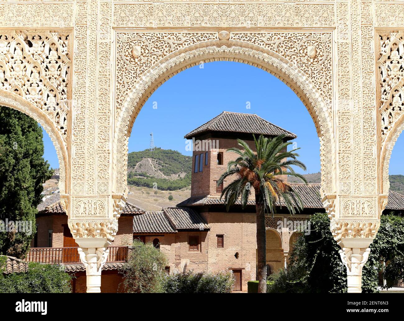 Arches in Islamic (Moorish) style and Alhambra, Granada, Spain Stock ...