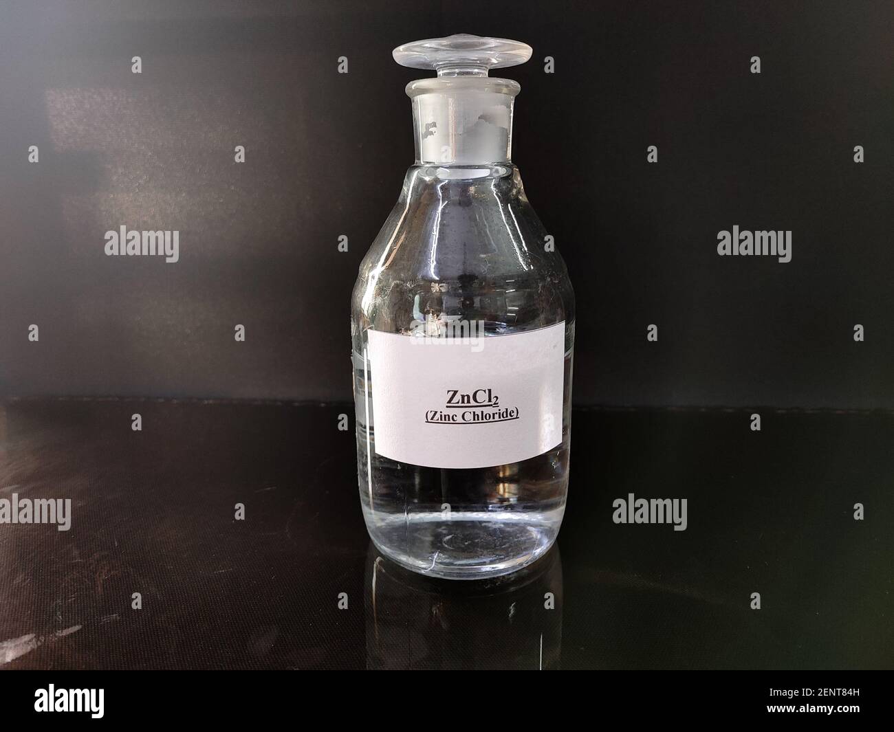 transparent bottle filled with reagent solution Stock Photo - Alamy