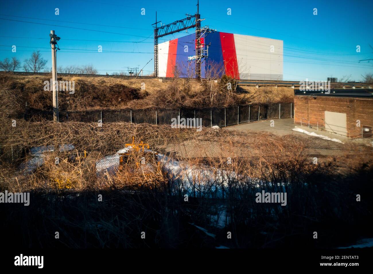 Monolithic self-storage building rises above the LIRR tracks on ...